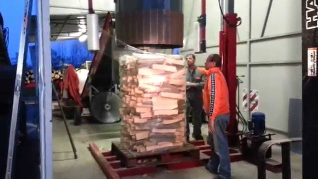 Firewood Packing - packaging wood - palettiseur bois de chauffage - YouTube