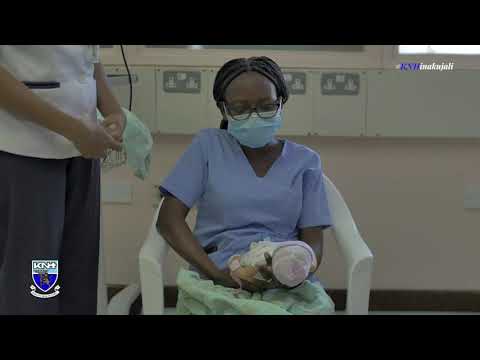 Kangaroo Mother care - Placing the baby in Kangaroo position - YouTube