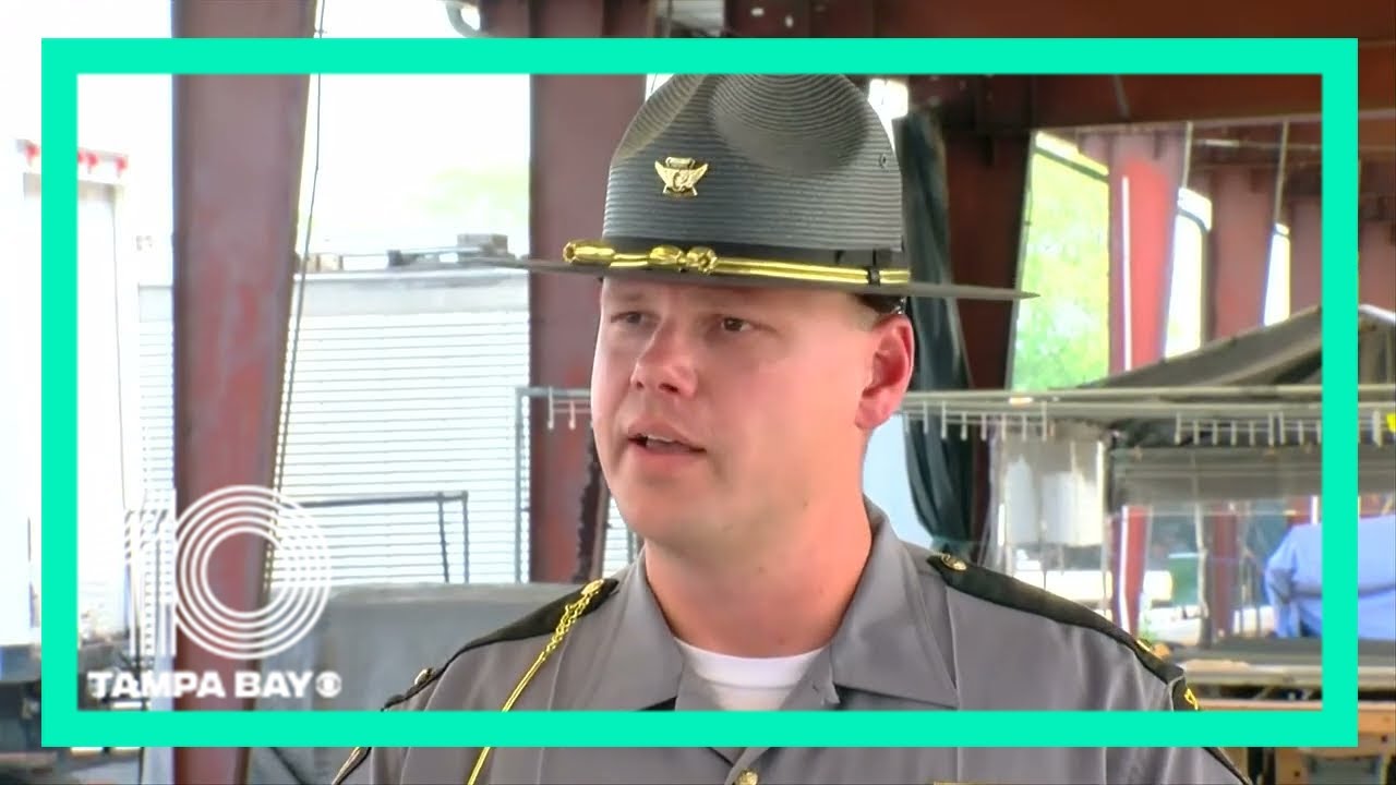 Authorities hold news conference after armed man approaches Ohio FBI ...