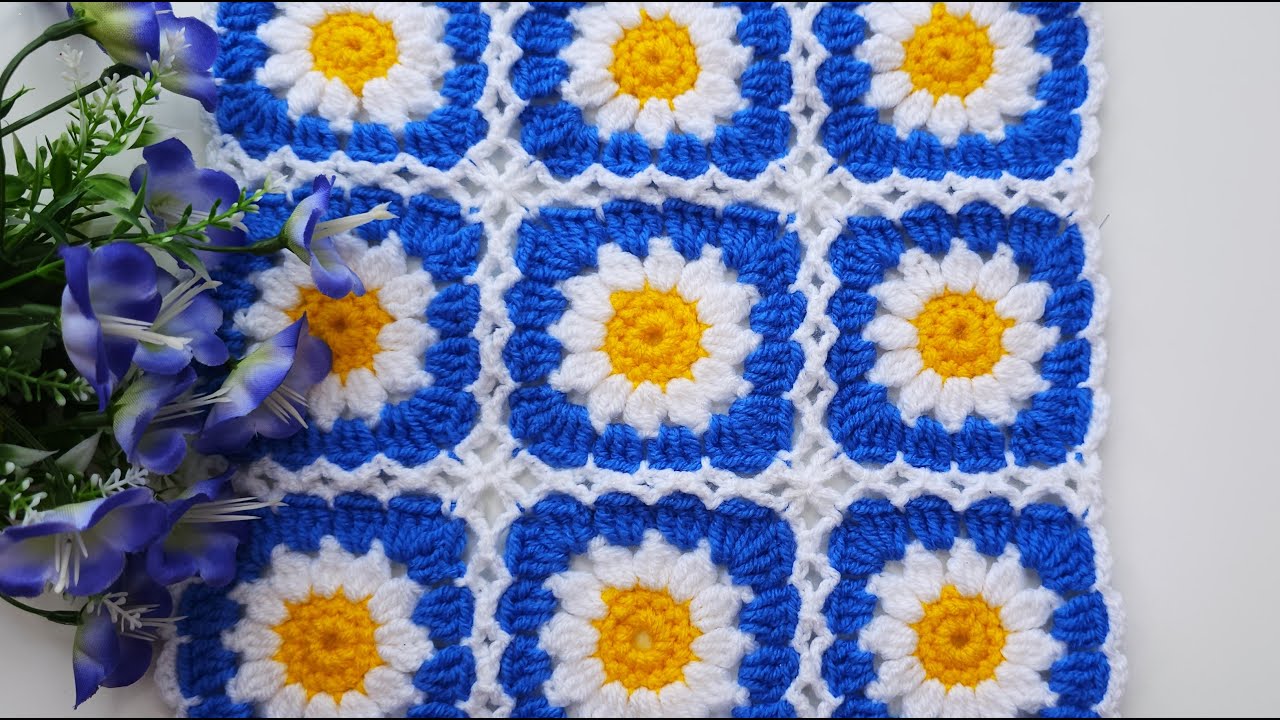 How to join crochet blue flower daisy motifs for blanket - YouTube