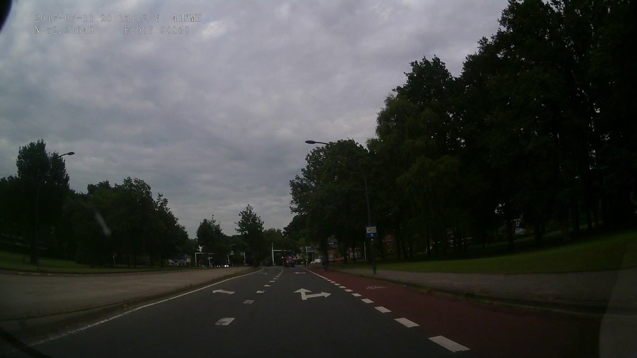 Clumsy driver takes turn too late and drives over the curb - YouTube