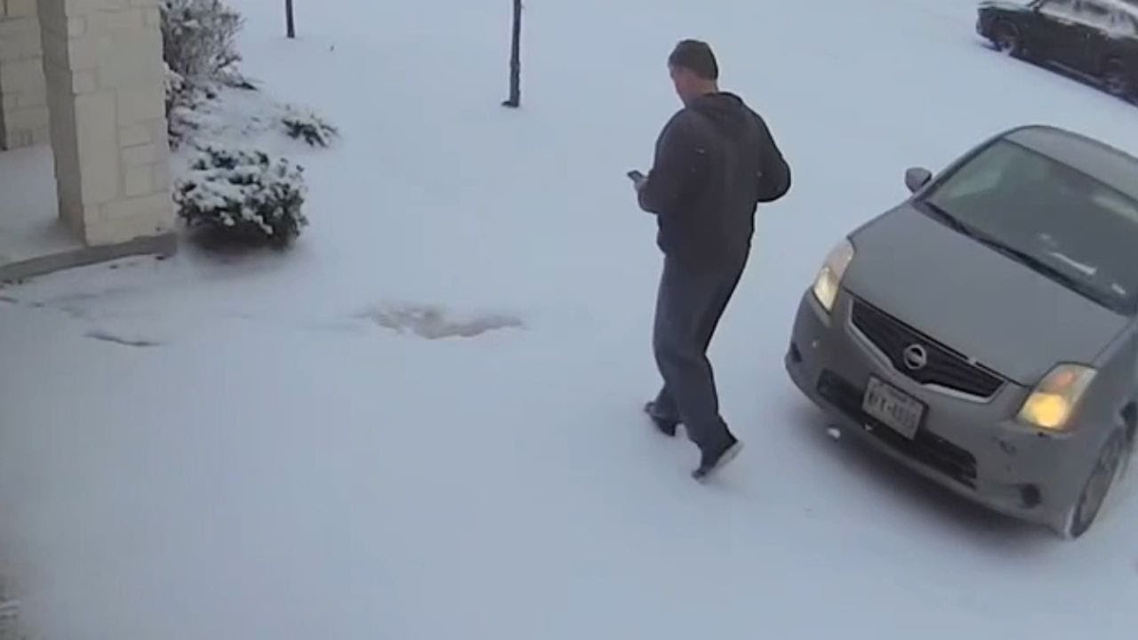 Icy ground snatches delivery driver's ability to walk without falling ...
