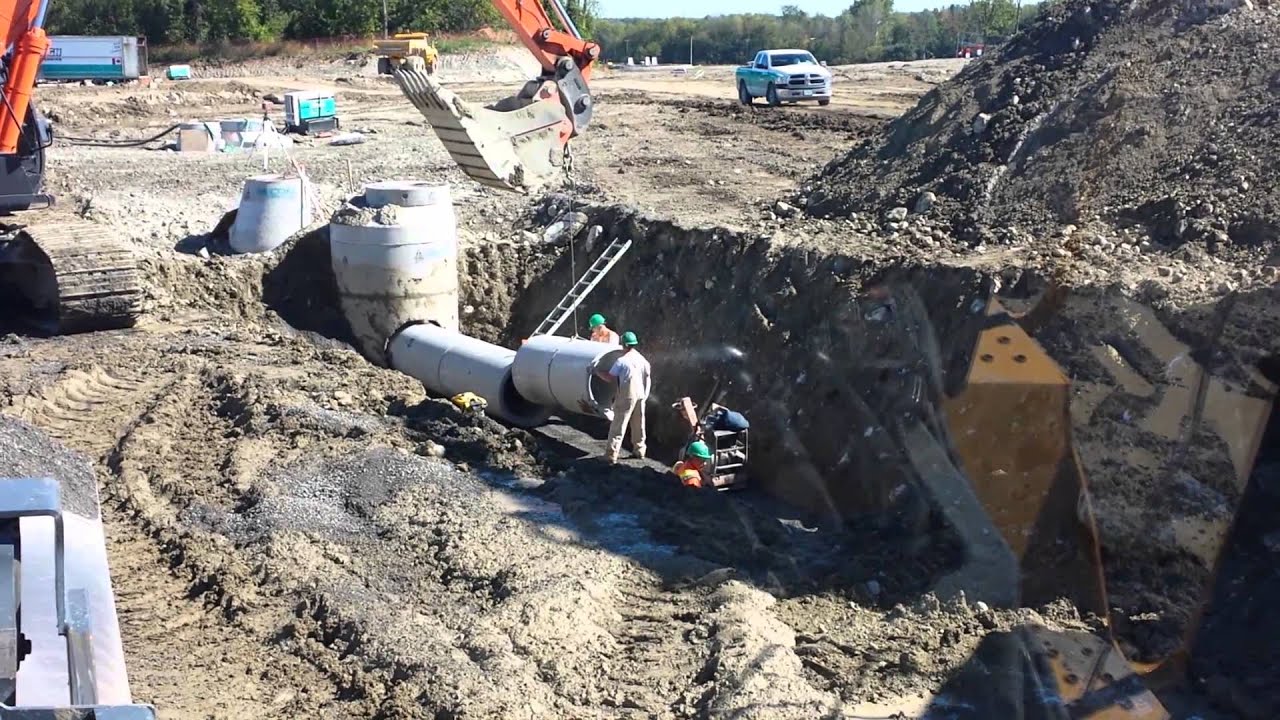 Cavanagh Sewer Crew Laying Storm Pipe in Ottawa 2013 - YouTube