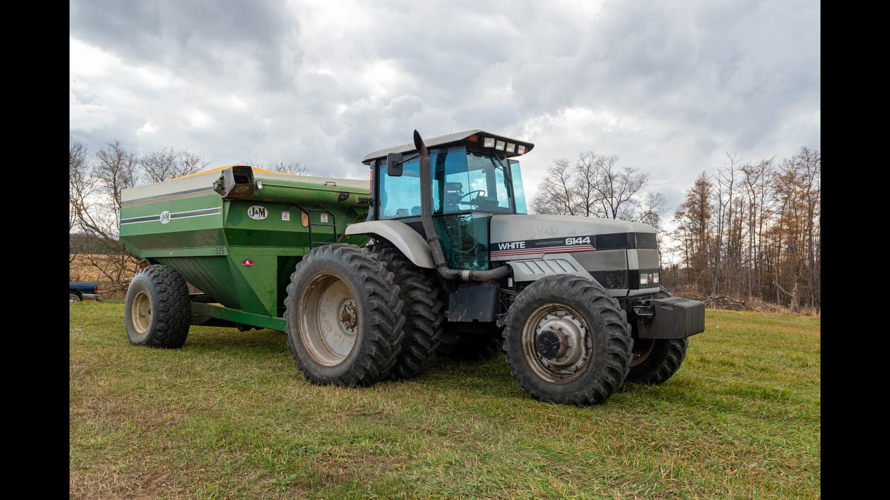 Agco White 6144 running a J&M 525 grain cart with a Gleaner S98 in ...