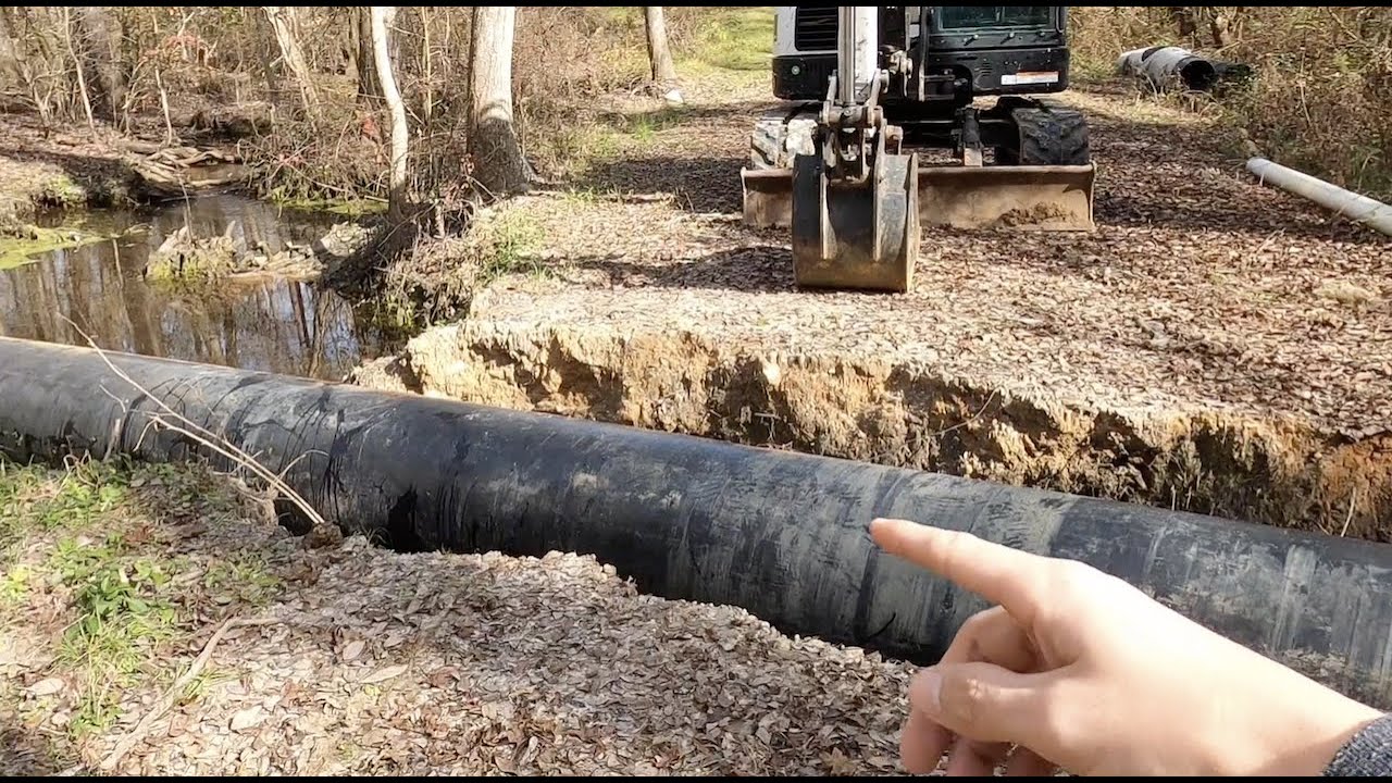 Fixing Washed Out Culvert With Bobcat E85 - YouTube