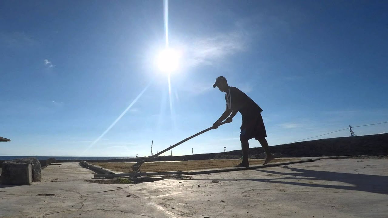 Rice Grain Sun Drying in Cabra Island - YouTube