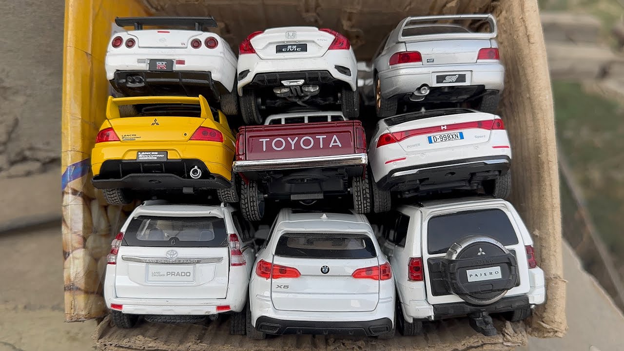 Lets pick up model cars,Toyota,Lancer,Bmw?Honda,Nissan gyr,Pajero ...