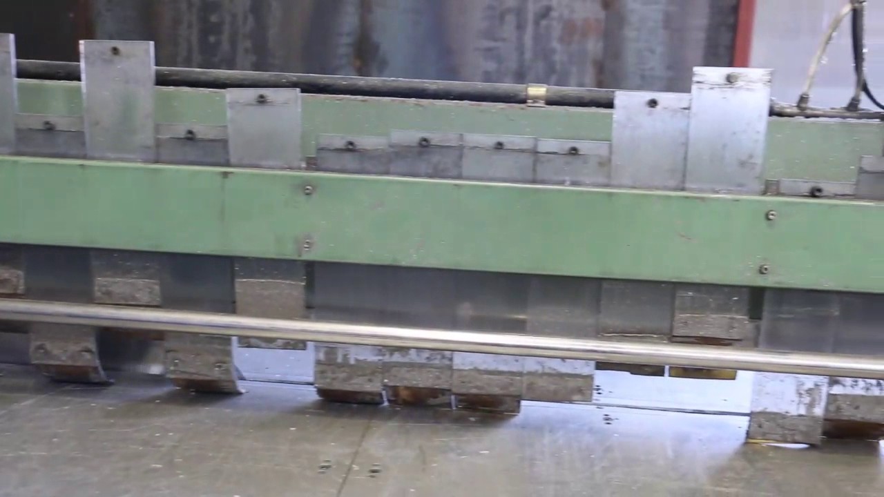 SMID automatic saw with chip conveyor OMSAT - YouTube