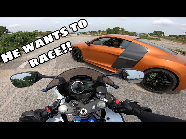 Audi R8 Races Motorcycles