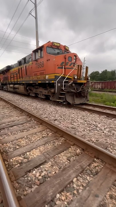 Spotted a BNSF GEVO duo idling with a rock train near BNSF Casey yard Red river subdivision ...