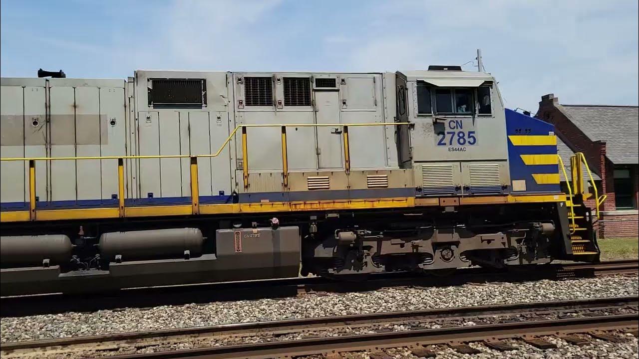 CN truck West, CN 2785, 3880 Eastbound train with ICG, CN 86' box car, CNW, SSW hoppers - YouTube