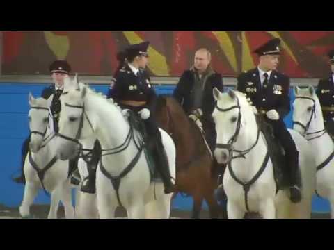 Russia's Putin rides tall in the saddle for Women's Day