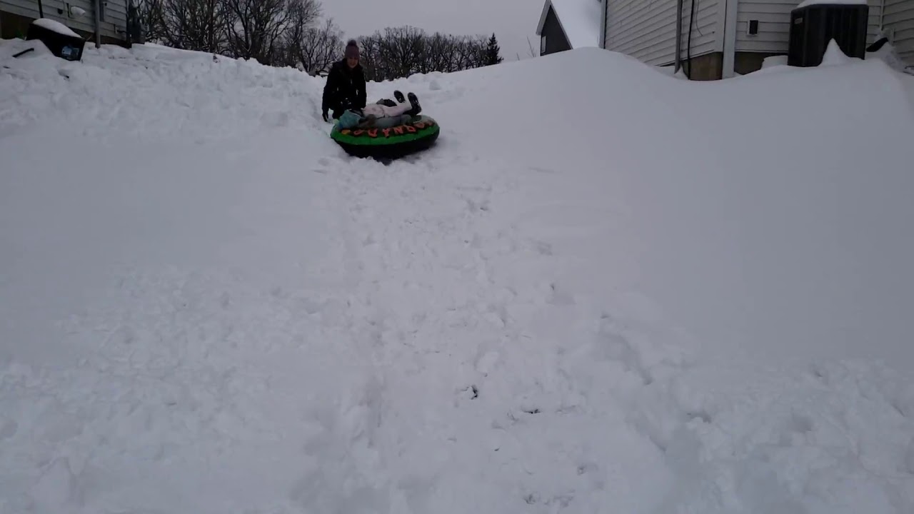 Emma and Bella sledding tubing - YouTube