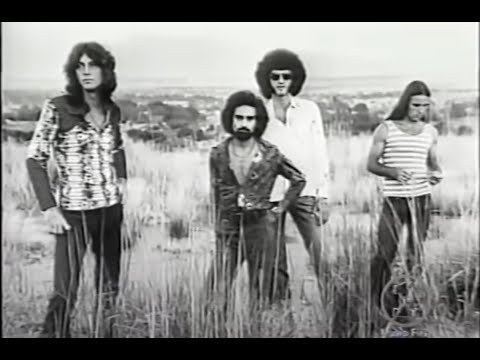 Grand Funk Railroad Behind The Music & Where are they now with advertisements.