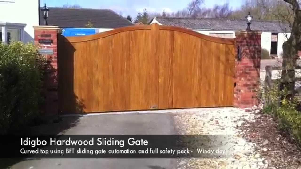 Swan Gates - Idigbo hardwood electric sliding gate - YouTube
