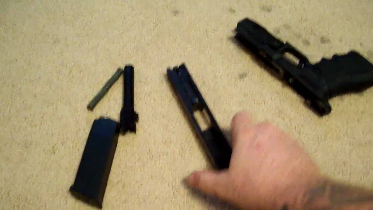 One handed Glock disassembly ,reassembly and reload. - YouTube