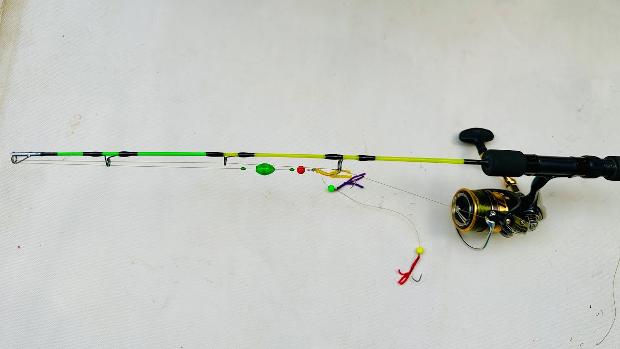 Ice fishing rod setup with line and hooks - YouTube