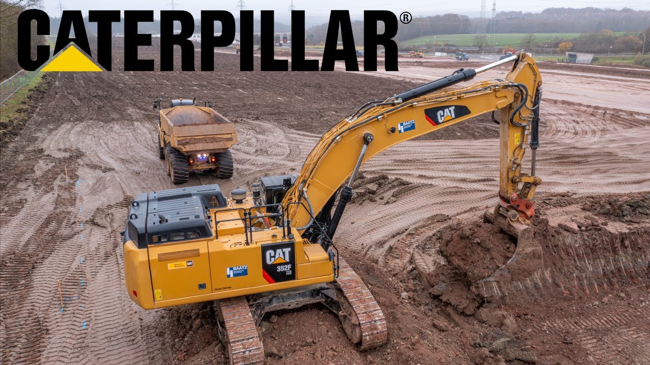 CAT 352F XE loading Adt´s - YouTube