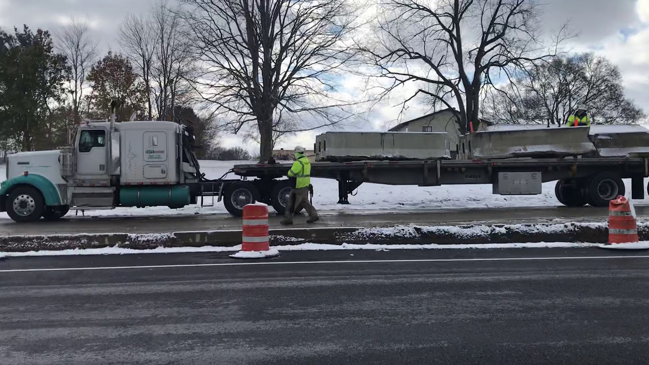 George J. Igel & Co. Inc. workers on state Route 256 in Pickerington ...