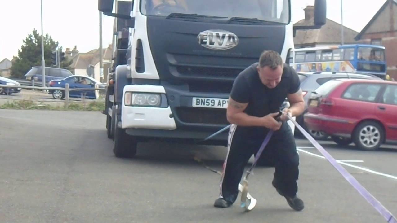 strongman truck pull - YouTube