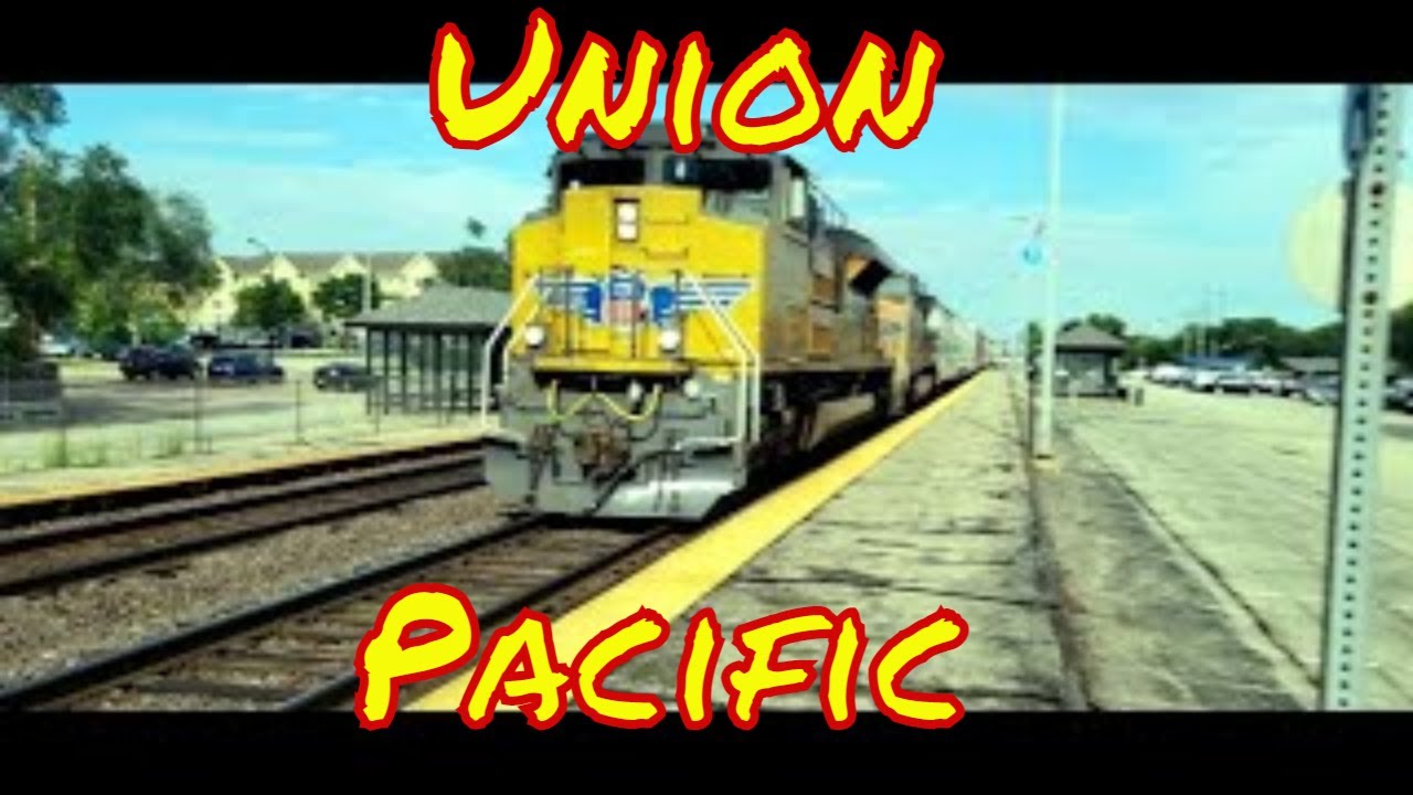 Two Huge Union Pacific Trains Crossing at the Geneva, Illinois Metra ...