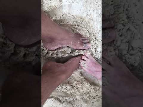 Bare feet in the sand