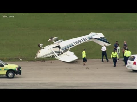 Plane flips over off Hooks Airport runway - YouTube