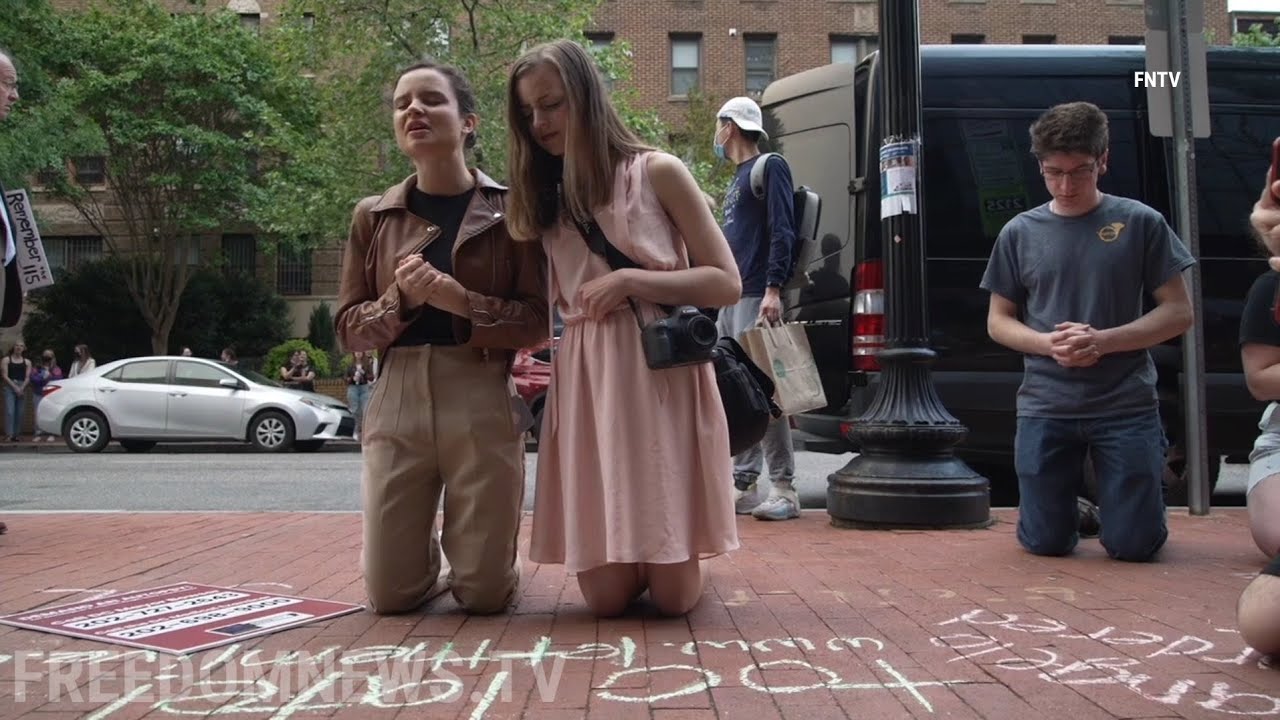 "Pro-life" storm abortion clinic building in DC - YouTube