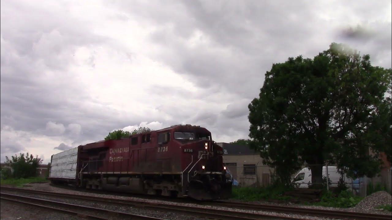 (CPKC) CP 420 with KCSM 4568 mid DPU passing Osler - YouTube