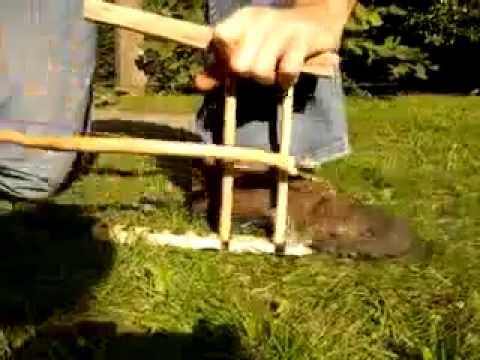 How to make a friction fire by rubbing sticks together - YouTube