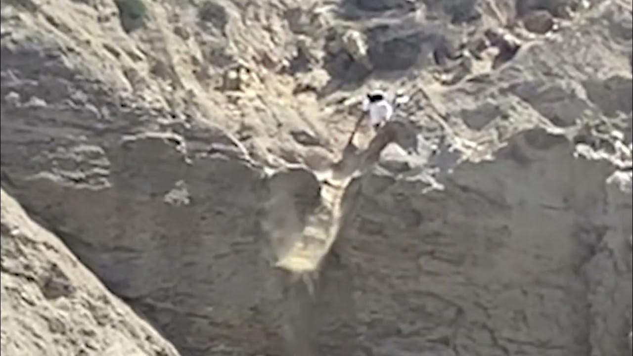 Man and Woman almost fall off cliff at Torrey Pines - YouTube