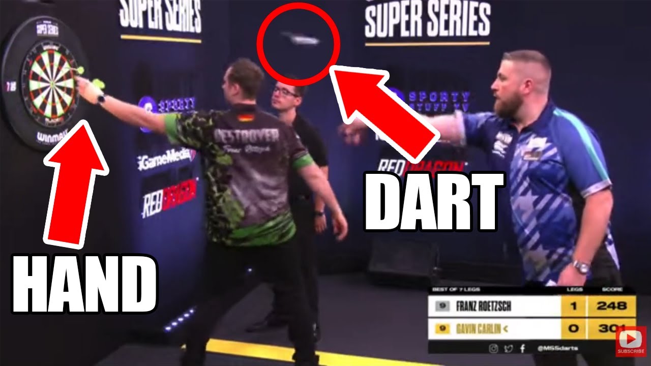 Dart Player ALMOST HITS Opponent WITH A DART - YouTube