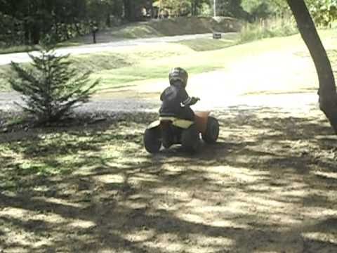 4 year old doing tricks on 4-wheeler! - YouTube