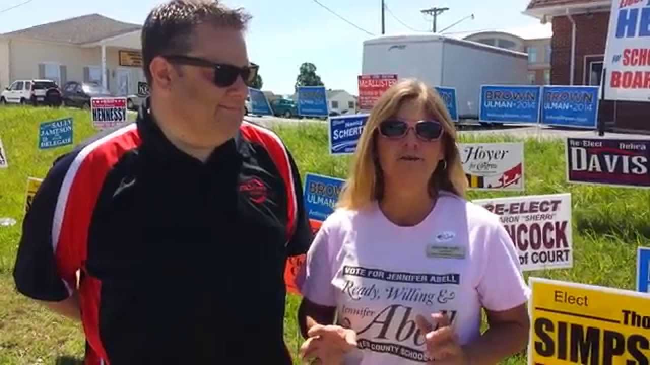 Sean of ALG speaks with Jennifer Abell - at early voting - for Board of ...