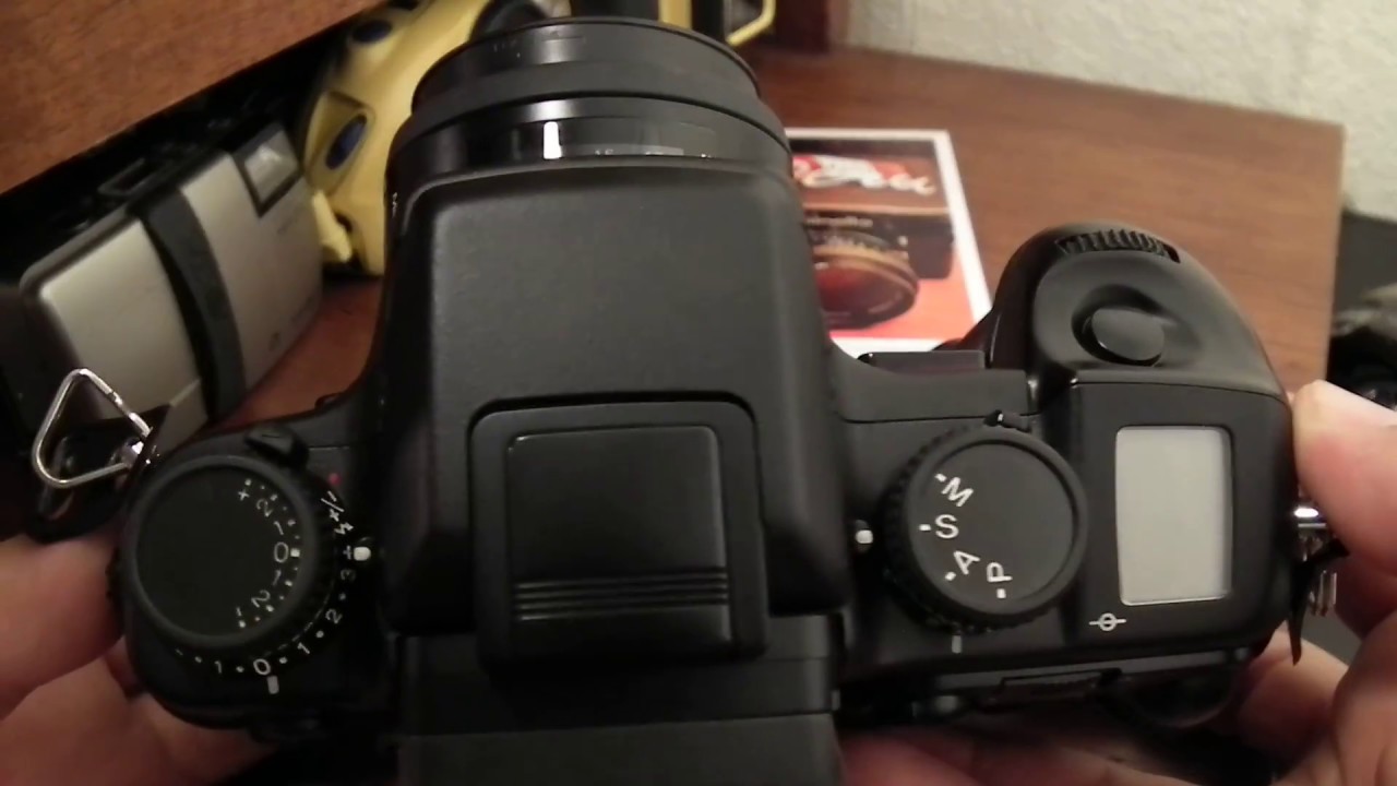 Minolta Maxxum 9 SLR AF 35mm. "Breve descripcion" AQP. - YouTube
