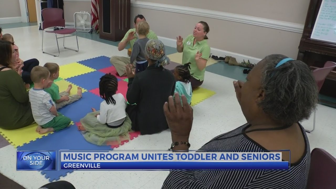 Music therapy class unites seniors, toddlers - YouTube