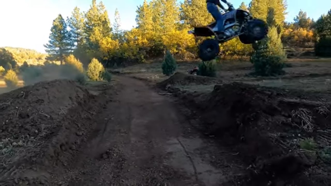 Case TV450 making raptor 700 ramps moguls - YouTube