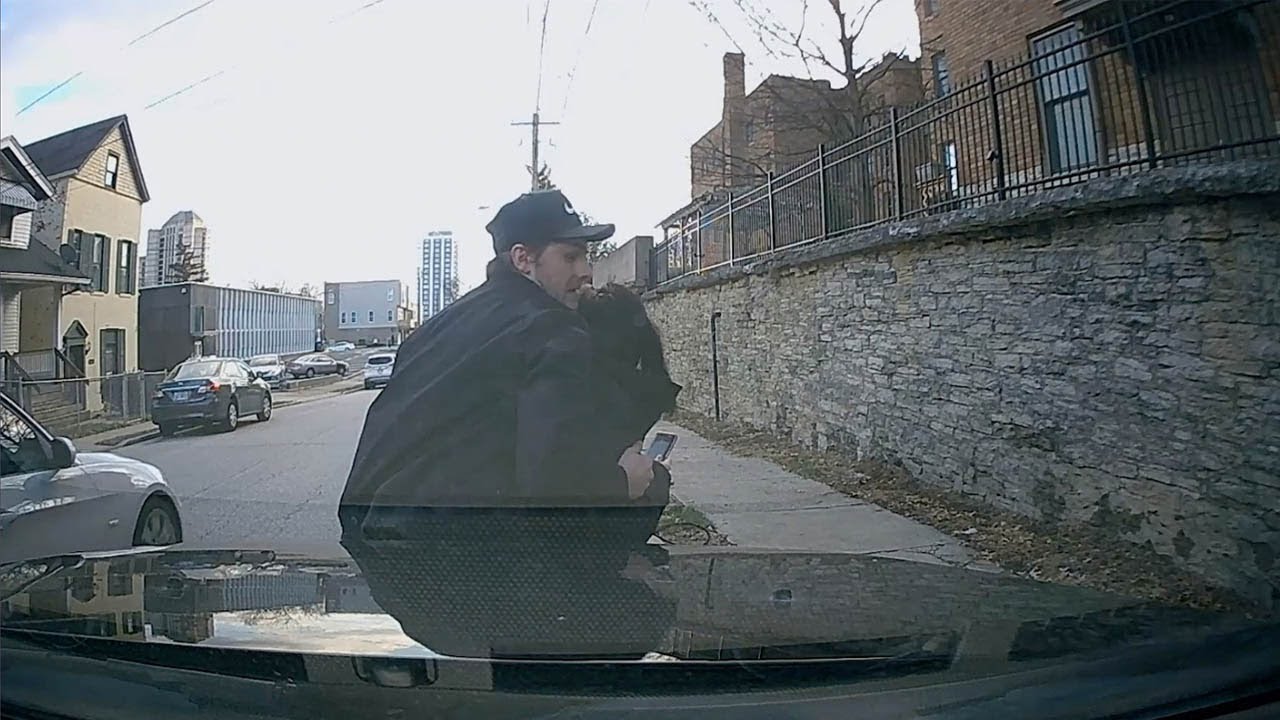 Man Stops Woman From Oncoming Car - YouTube