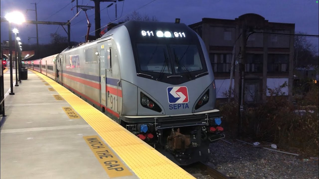 SEPTA ACS-64 #911 departs Fern Rock bound for Thorndale - YouTube