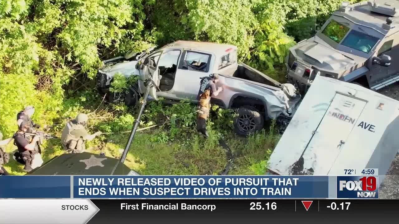 Police release video of man running truck into train during chase - YouTube