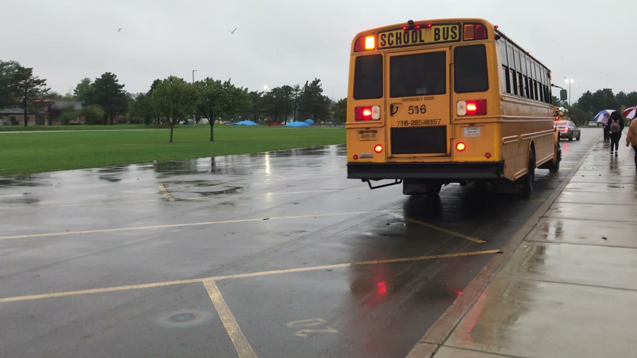 Some more buses at the high school - YouTube