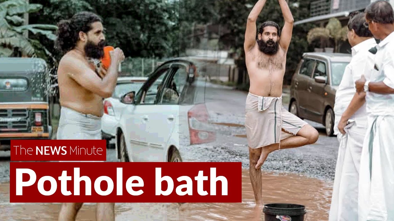 Kerala man takes a bath in a pothole in unique protest - YouTube