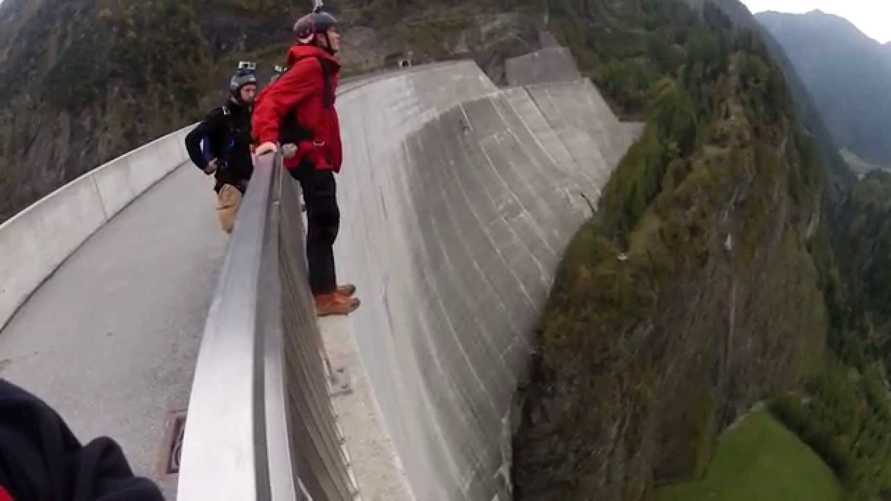 Epic base jump backflip off huge dam! - YouTube