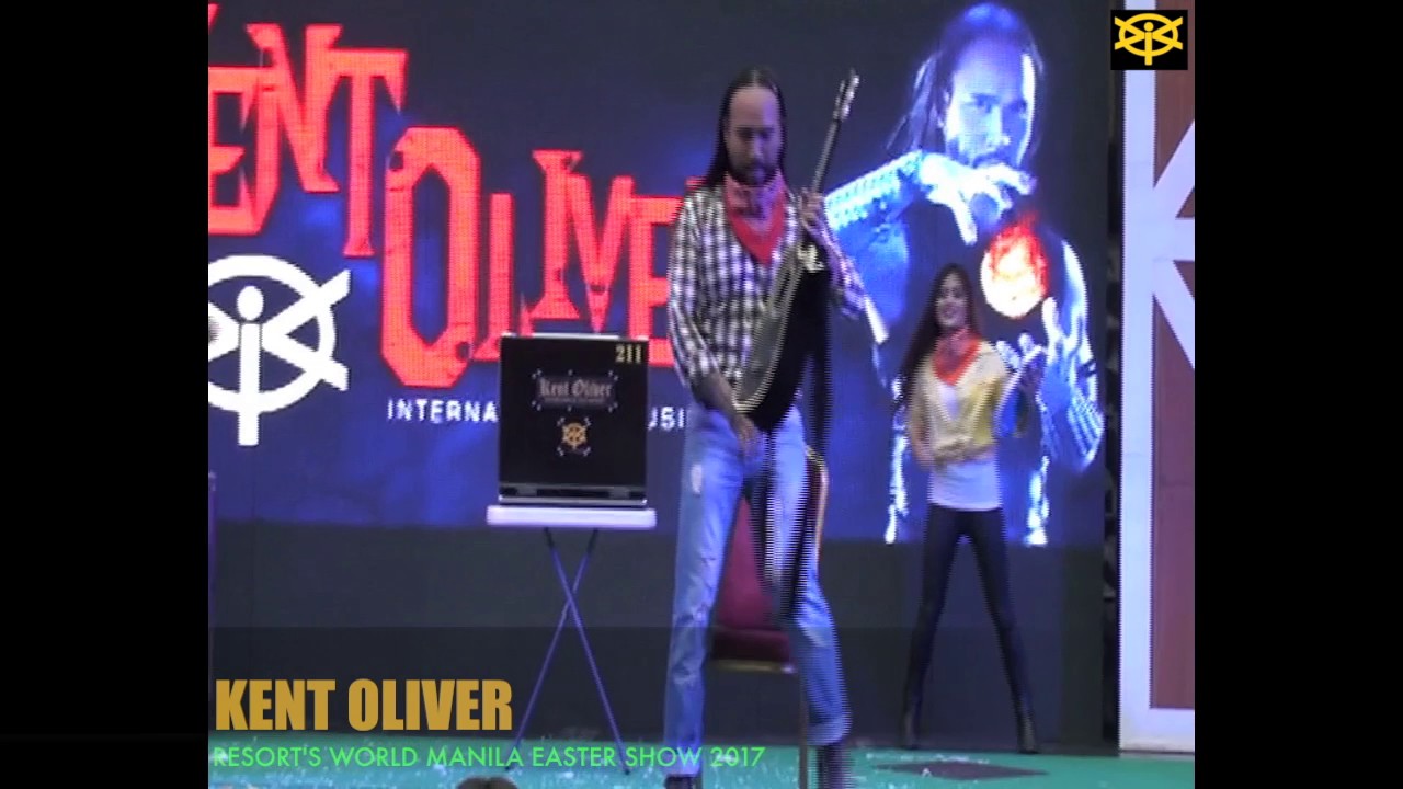 KENT OLIVER FLOATING GUITAR ACT / RESORT'S WORLD - YouTube