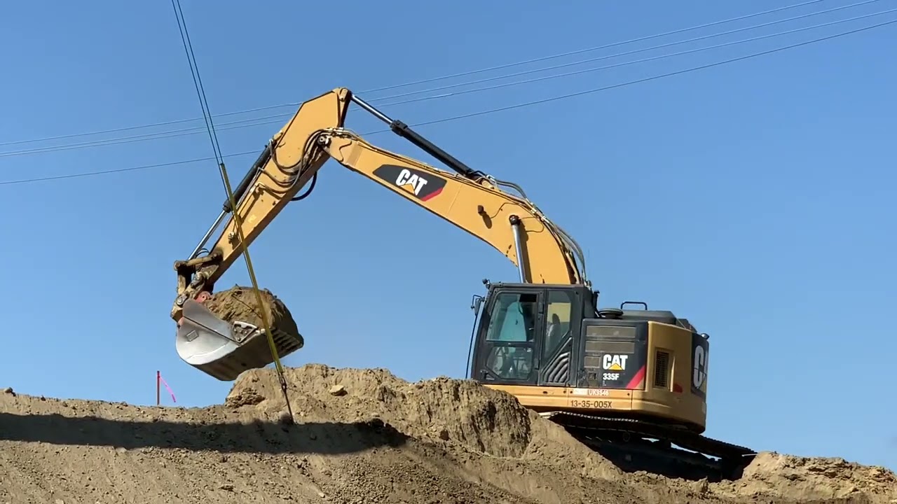CAT 335F - YouTube