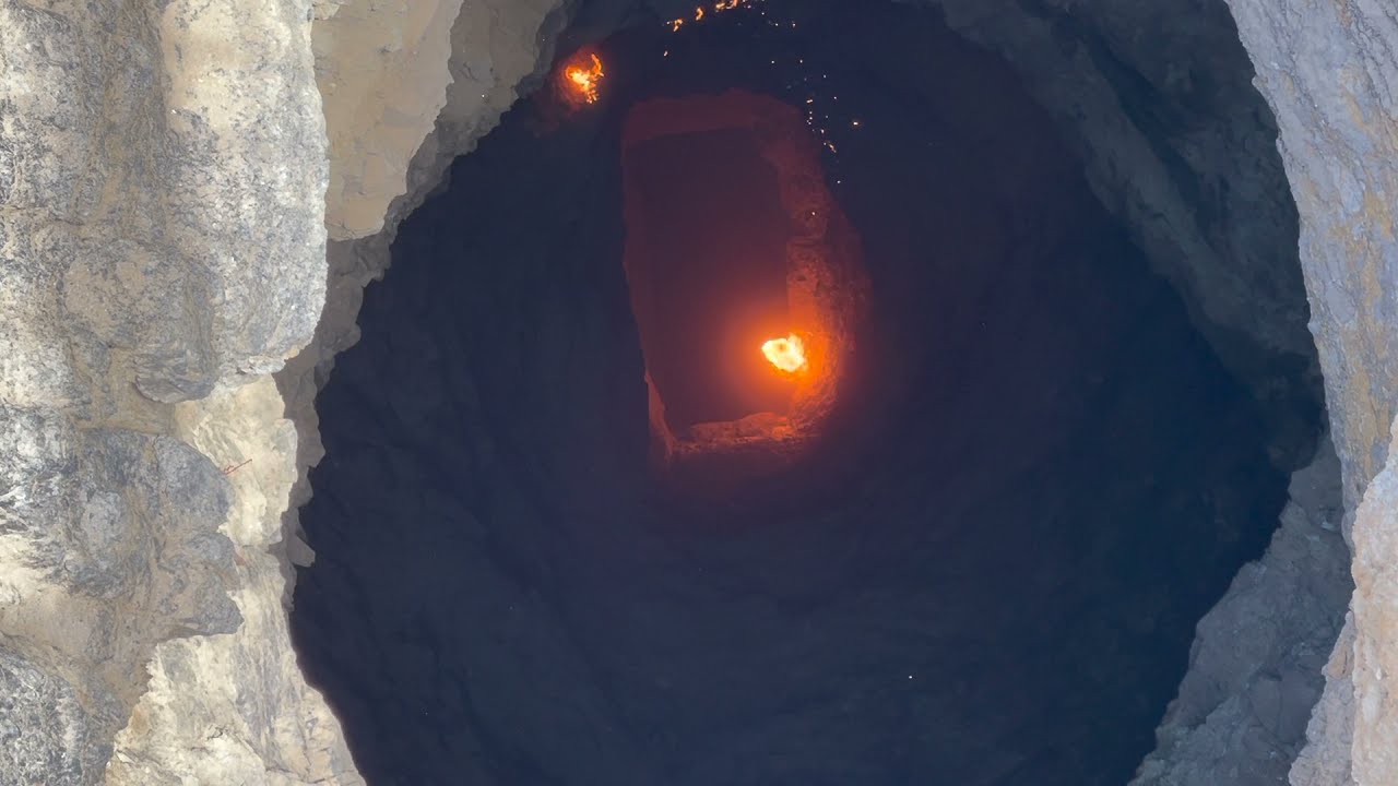 Dropping balls of FIRE down DEEP mine shaft! - YouTube