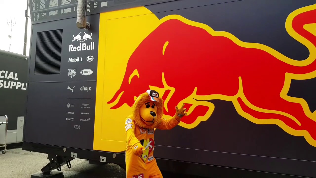 Lucky gratefully lion mascot. Aston Martin Red Bull Racing. - YouTube
