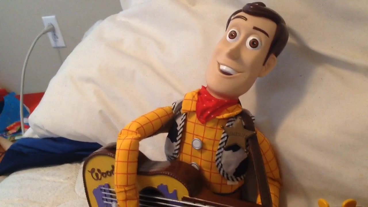 MY FIRST TOY REVIEW! toy story 2 strummin singing woody toy review ...