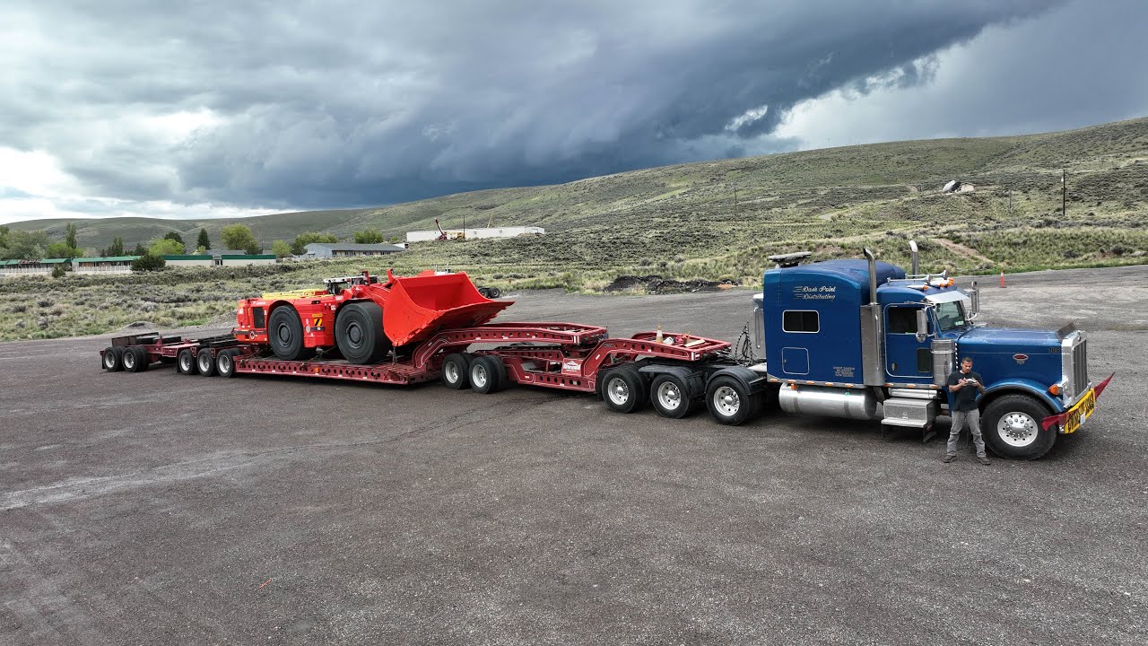 Join me while I load this 106,000 pound Sandvik mining ⛏️ loader on 11 ...