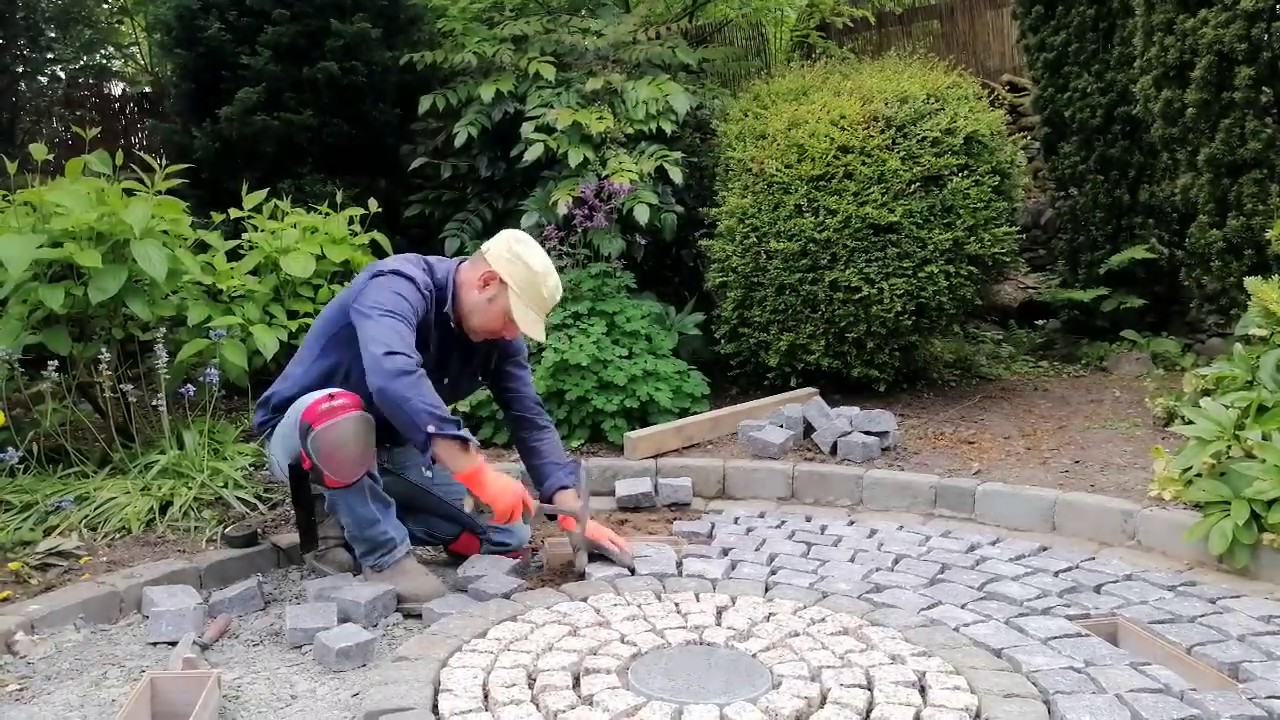 How to lay 100x100x50mm granite setts. - YouTube